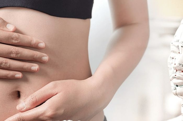 Titik Pijat Efektif Untuk Redakan Masuk Angin dan Perut Kembung - Grid Health