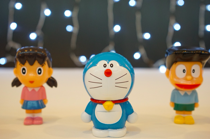 Mengapa Doraemon Berwarna Biru dan Enggak Punya Telinga? Ternyata Ini ...